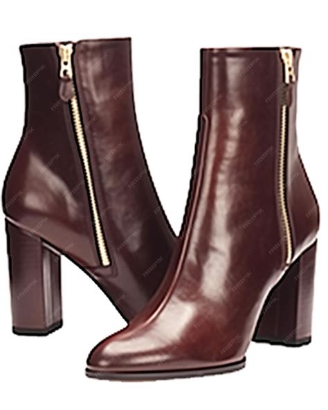 Premium Photo A Pair Of Brown Leather Ankle Boots With A Zipper On