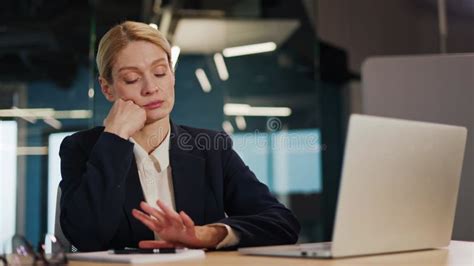 Bored Tired Businesswoman Looks Exhausted While Working In Her Office