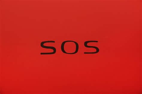 Premium Photo Abbreviation Sos Save Our Souls Written On Red