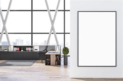 흐릿한 도시 전망과 장비 3d 렌더링이 있는 흰색 벽 가구 탁 트인 창 프레임에 빈 모의 포스터가 있는 현대적인 목재 및