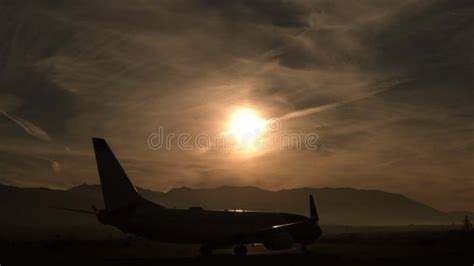 Airplane In The Airport Runway Positioning To Taking Off At Sunset Stock Video Video Of