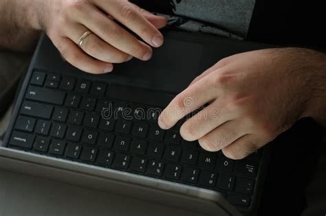A Closeup Of Hands Typing On A Keyboard Representing Work Productivity And Digital