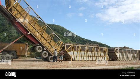 QUEENSLAND AUSTRALIA TH JULY Three Heavy Duty Containers Being Unloaded From Large