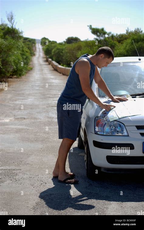 Man Looking At Road Map Stock Photo Alamy