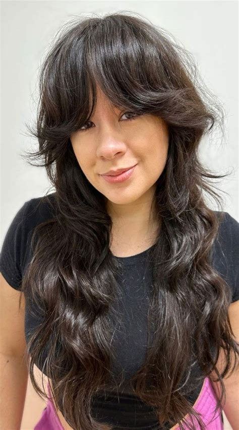 40 Long Layered Haircuts To Try Right Now Retro Inspired Shaggy