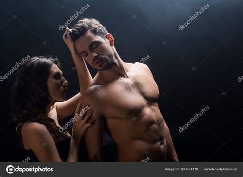 Side View Beautiful Girl Pulling Hair Shirtless Man Isolated Black Stock Photo VitalikRadko