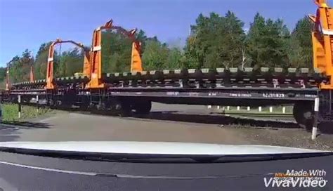 Semi Truck Tries To Drive Over Train Tracks