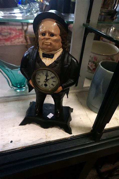 Sold Price Reproduction Cast Iron Man With Moving Eyes Clock Invalid
