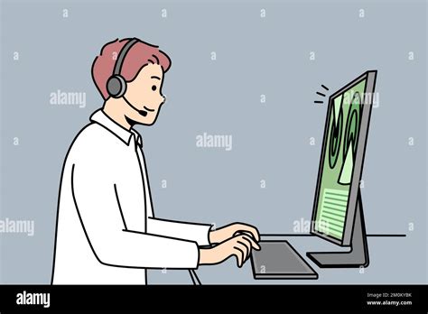 Web Designer In Headset Works At Computer Man Programmer In Headphones