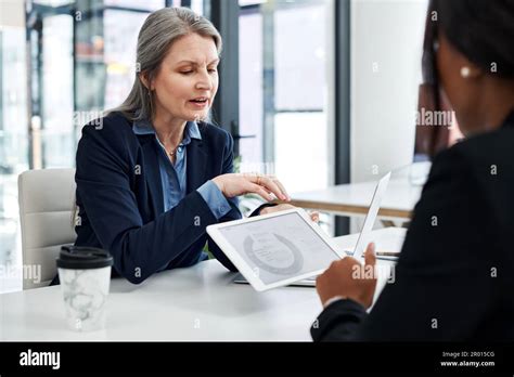 The Data Doesnt Lie A Mature Businesswoman Using A Digital Tablet