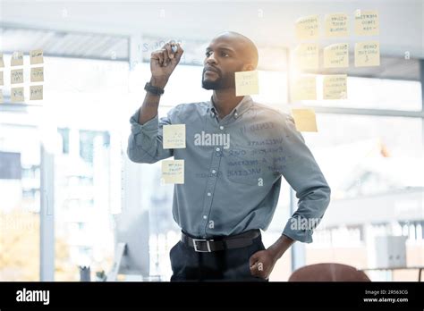 Planning Writing And Business Man On Glass Board For Brainstorming