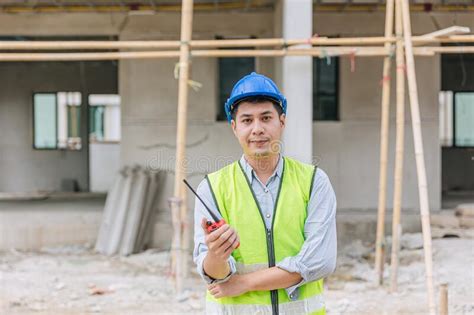 Portrait Asian Male Builder Worker Foreman Engineer At Construction Site Home Building Project