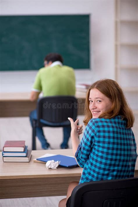 Two Students Having Fun In The Classroom Stock Image Image Of