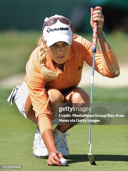 Lpga Golfer Natalie Gulbis Sets Her Ball Before Putting On The 9th