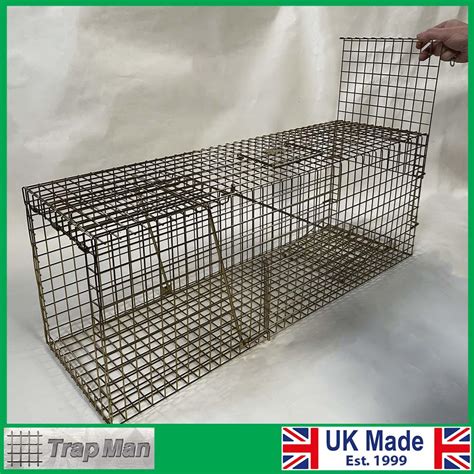 The Pro Feral Cat Trap Has A Rear Sliding Door That Is Made From Clear