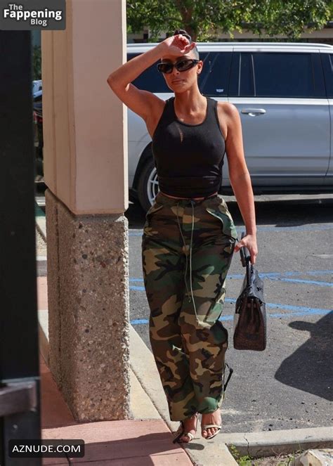 Kim Kardashian Flaunts Her Sexy Pokies At Mamba Academy In Thousand