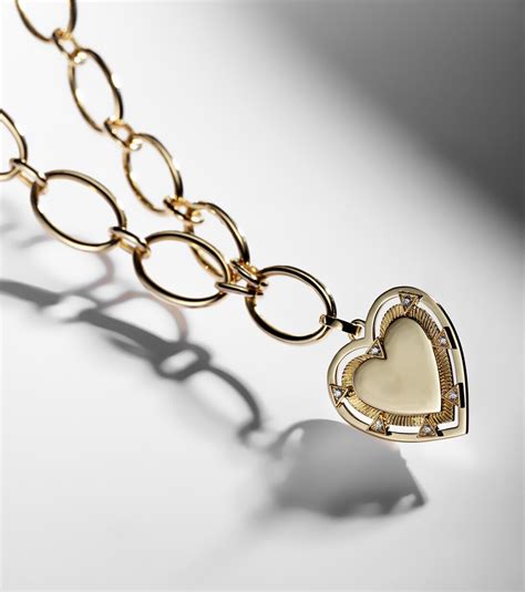 Love Heart Token 18kt Gold Pendant Necklace With Diamonds In Gold