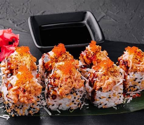 Premium Photo Japanese Sushi Volcano Roll With Eel On Top And Sesame Inside