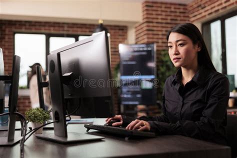 Employee Analyzing Marketing Project Dashboard On Computer Screen Stock