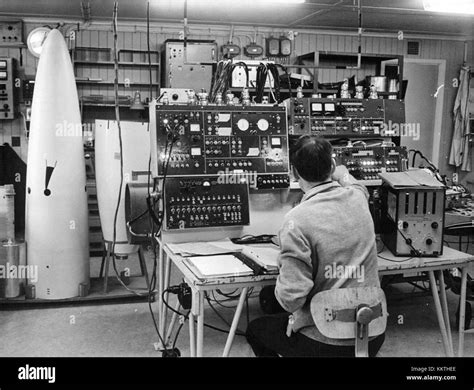 An Electrical Engineer Tests Specialized Equipment At The Air Force Test Center Where Military