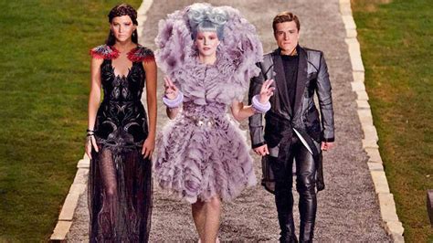 The Hunger Games Costumes The Bold High Fashion Look Of Catching