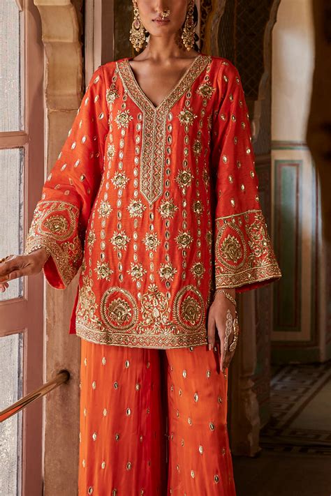 Buy Orange Embroidered Kurta Sharara Set By The Royaleum Atelier At