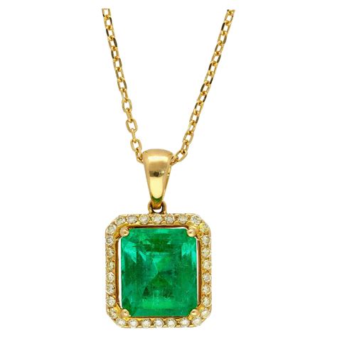 642 Carat Floating Emerald With Diamond And Emeralds In 18k Pendant