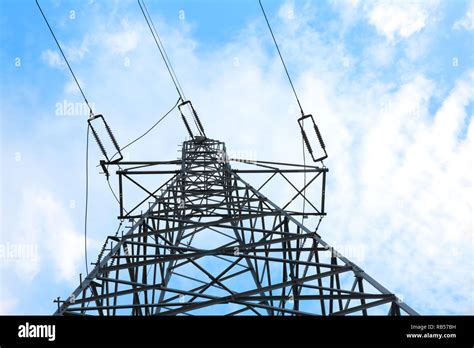 Overhead Transmission Of Electricity Through High Voltage Lines With Ropes Between High Columns