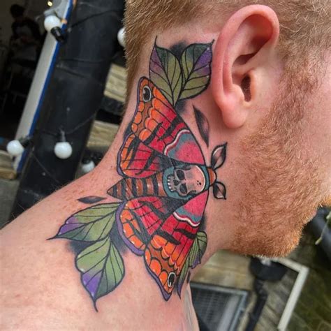 Moth Neck Tattoo Design Symbolism Style And Placement Guide