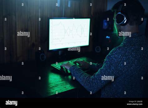 Just Breached Down A Firewall A Young Man Using A Computer And Hacking