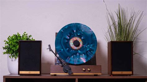 Fuse Audio Gld Vertical Vinyl Player Has Two Bookshelf Speakers