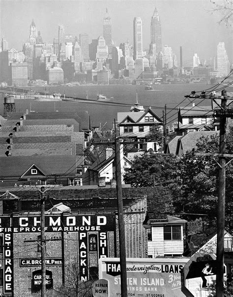 Distant View Of Lower Manhattan And Ferry Docks As Seen W The Aid Of A