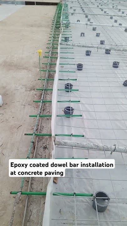 Epoxy Coated Dowel Bar Installation At Concrete Paving Oil And Gas Plant