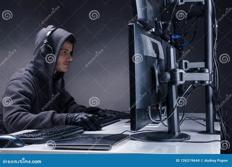 Hacker Using Mobile Smartphone And Stealing Personal Information Through Data In Order To