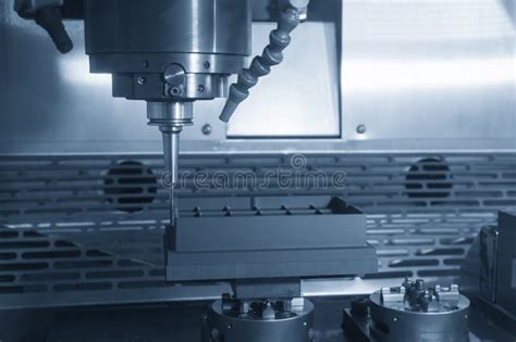 The Cnc Milling Machine Finishing Cut The Graphite Electrode Parts With