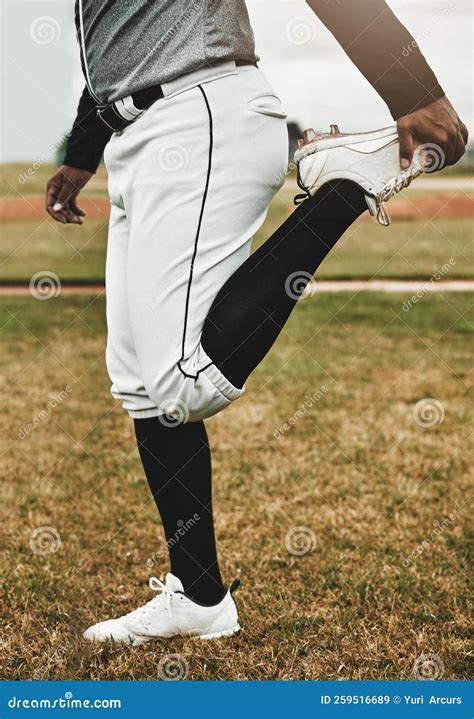 Baseball Player Stretching And Man On Sports Field Doing Warm Up