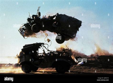 Cars Leaps Through The Air Mad Max Beyond Thunderdome 1985 Stock