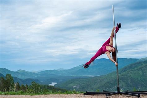 Premium Photo Beautiful Redhaired Woman Dancing On A Portable