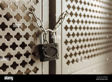 Background Image Gate With A Lock On The Chain Stock Photo Alamy