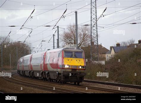Lner Dvt 82211 Leads A Class 91 Express Train Past Offord Cluny On The