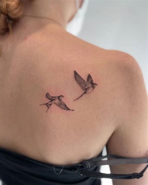 Fine Line Swallows Tattooed On The Shoulder Bladeoo