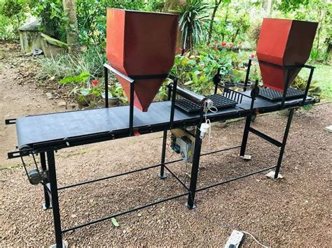 Design And Development Of Automated Seeding Tray Filling Machine Final Year Project