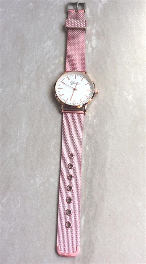 Geneva Pink Womens Rose Gold Watch Round White Dial On A Pink Silicone