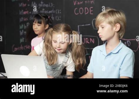 smart girl using laptop programing engineering code with diverse