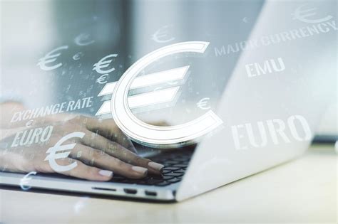 Premium Photo Creative Euro Symbols Illustration And Hands Typing On Computer Keyboard On