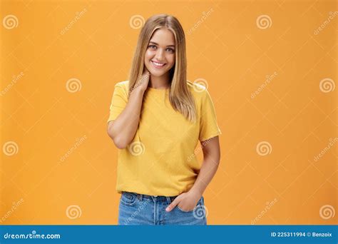 Portrait Of Shy And Timid Feminine Girl With Tan And Straight Fait Hair
