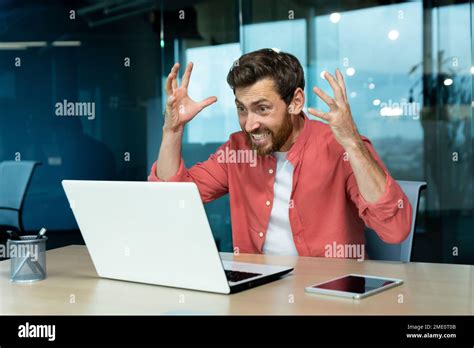 Angry And Nervous Businessman Talking On Video Call Remotely Man