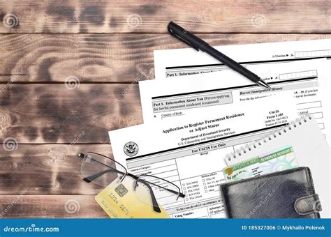 Uscis Form I 485 Application To Register Permanent Residence Or Adjust Status Lies On Flat Lay