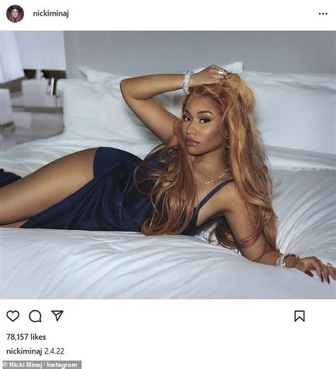 Nicki Minaj Stuns In A Revealing Dark Blue Dress And A Strawberry Blonde Tresses During A
