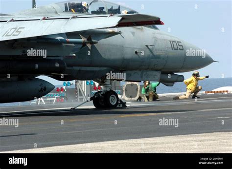 Us Navy Lt Cmdr Gives The Launch Signal To An F 14d Tomcat Assigned